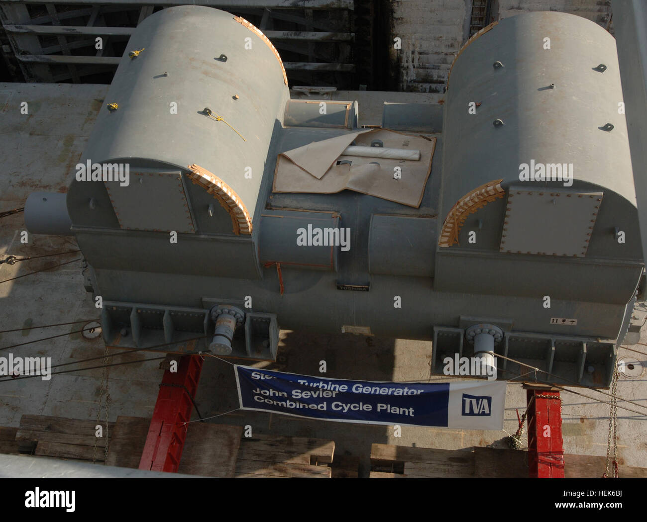 A barge carrying a 750,000-pound generator and 500,000-pound turbine ...
