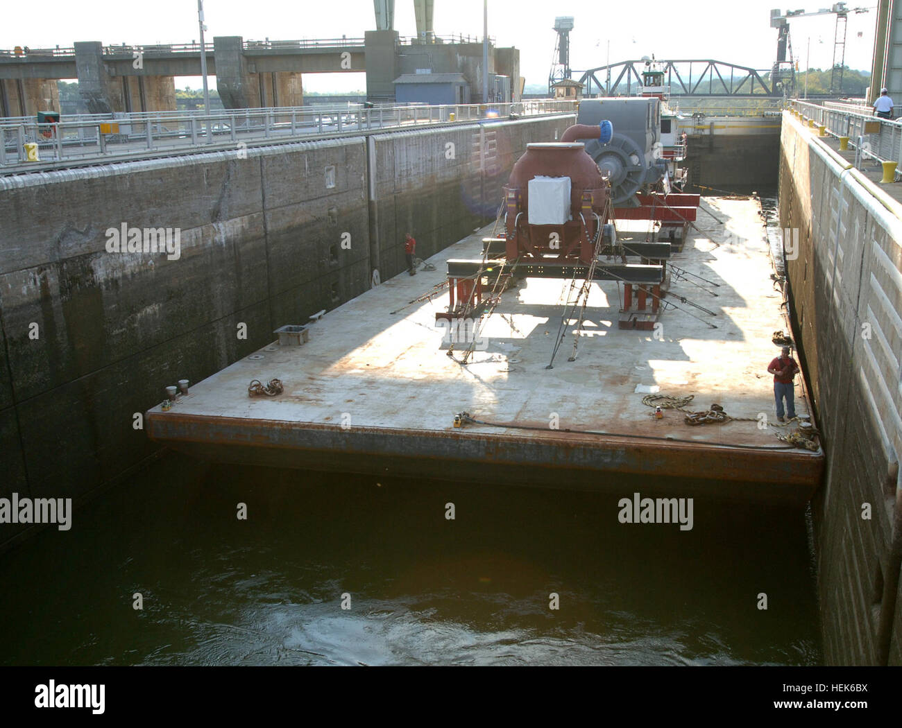 A barge carrying a 750,000-pound generator and 500,000-pound turbine ...