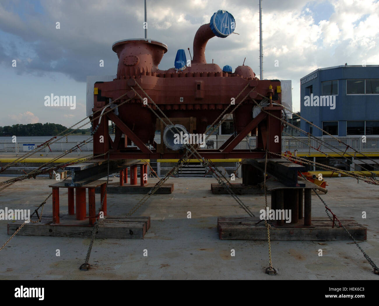 A barge carrying a 750,000-pound generator and 500,000-pound turbine ...