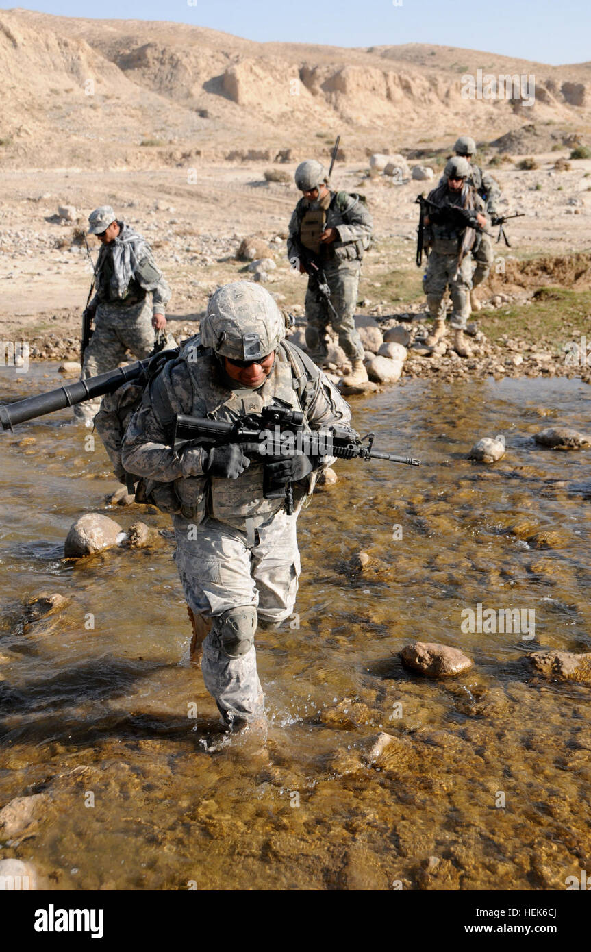 U.S. Army soldiers from the 4th Infantry Regiment conduct area ...