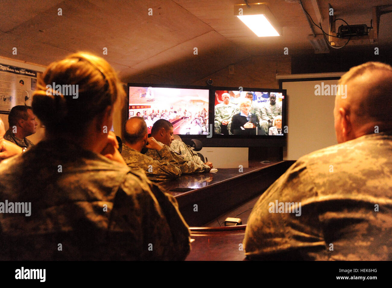 Members of the 46th Military Police Command attend a video ...