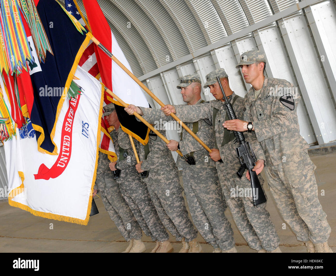 Soldiers present and post the colors of the 4th Infantry Division ...