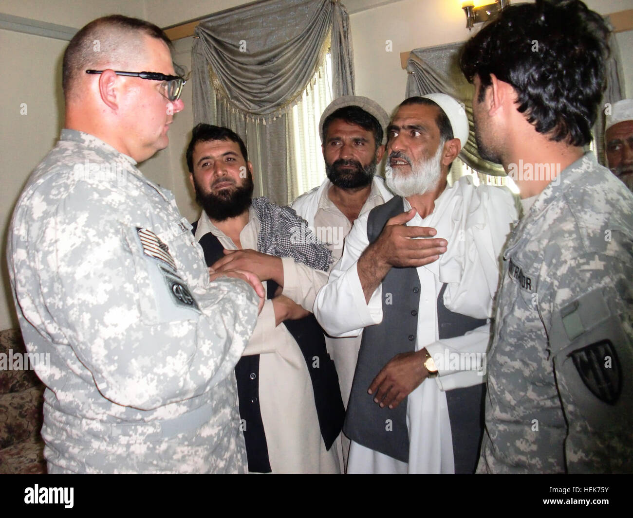 U.S. Army Staff Sgt. Patrick M. Grace, squad leader with 630th Military ...