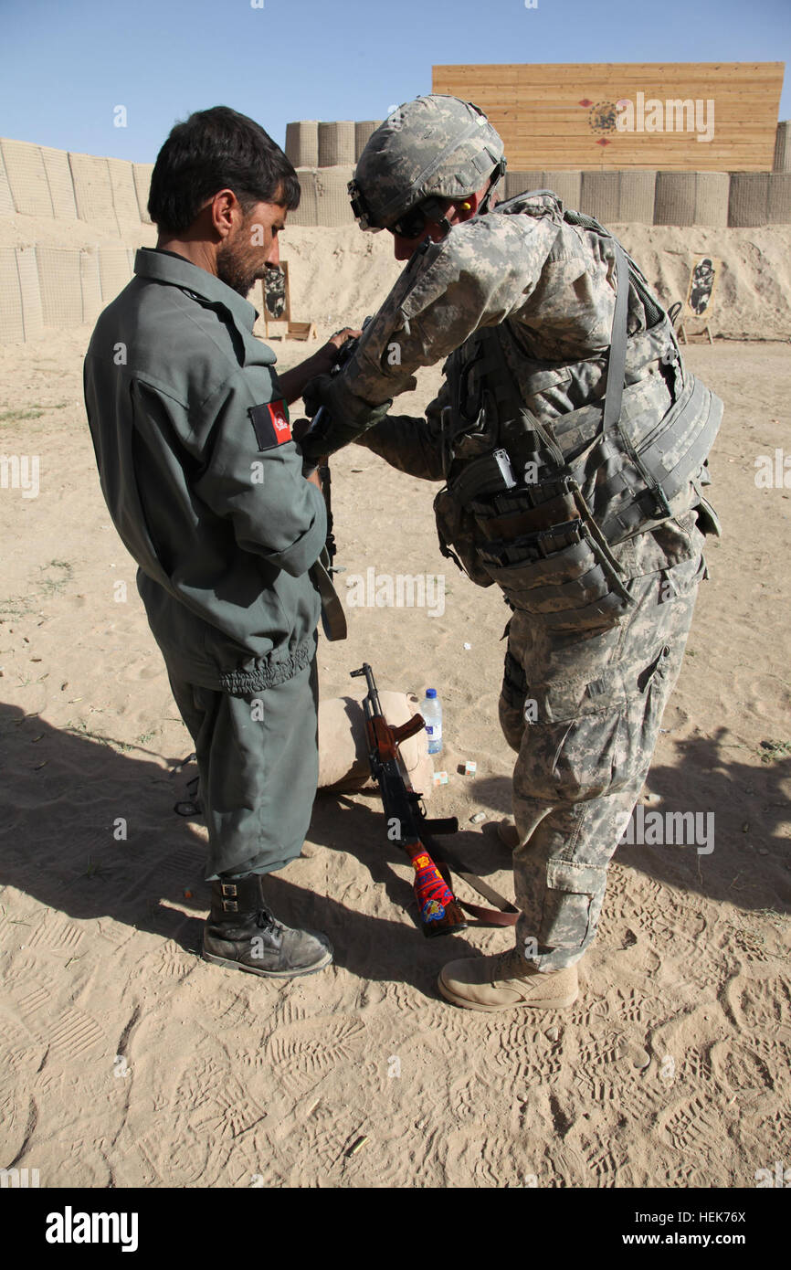 A U.S. Soldier, right, with the 552nd Military Police Company, 504th ...