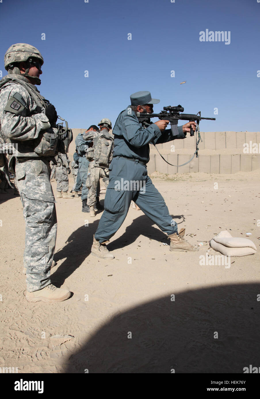 A U.S. Soldier, left, with the 552nd Military Police Company, 504th ...