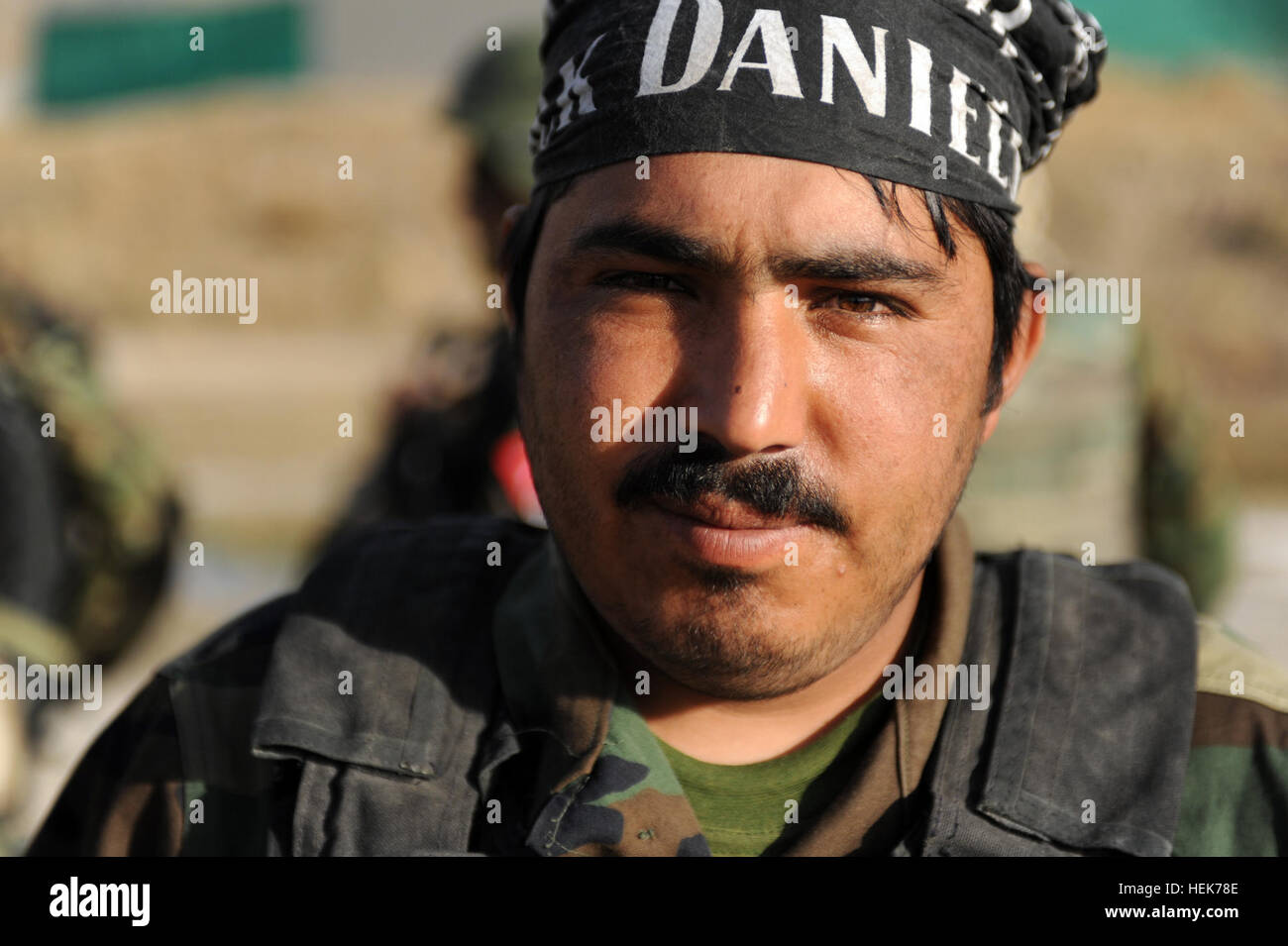 An Afghan Commando from 2nd Commando Kandak, stands by at a helicopter ...