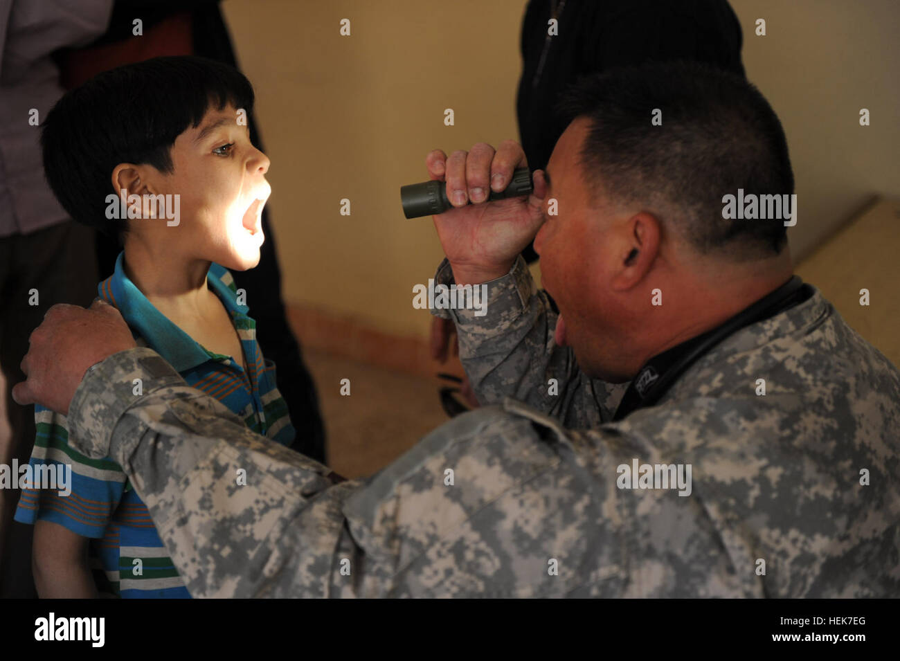 Lt. Col. Jonathan Leong (right), battalion surgeon with 3rd Battalion ...