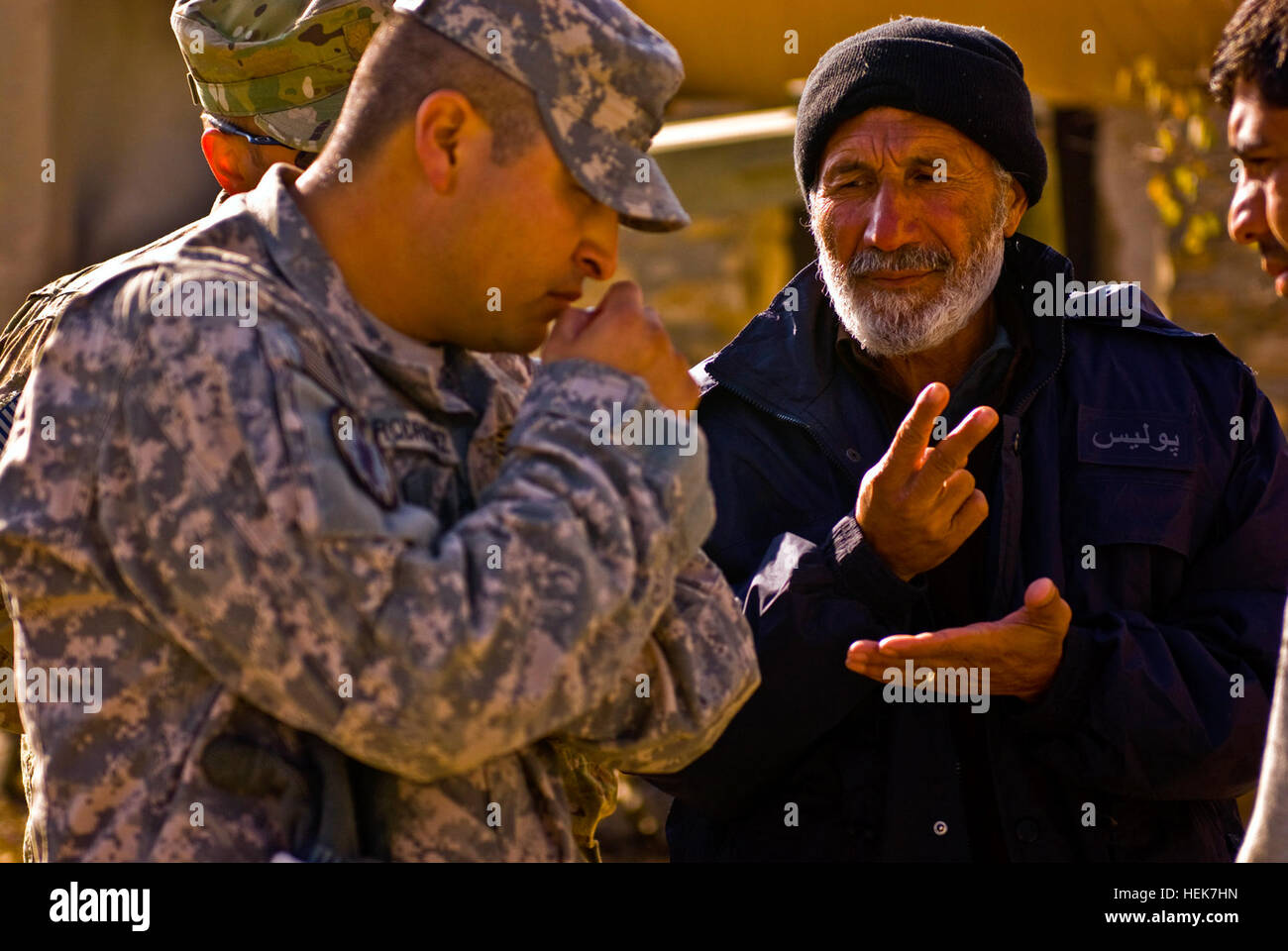 U.S. Army Sgt. 1st Class Richard B. Rodriguez II (left), a platoon ...