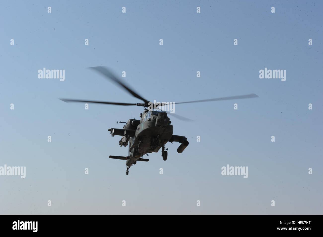 An AH-64 Apache Longbow moves across the desert of Besmaya Range ...