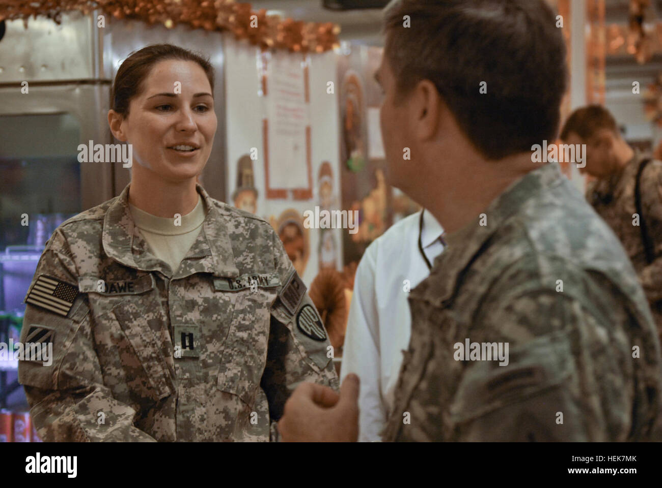 Capt. Tara Dawe (left), commander of 442nd Military Police Company, 3rd ...