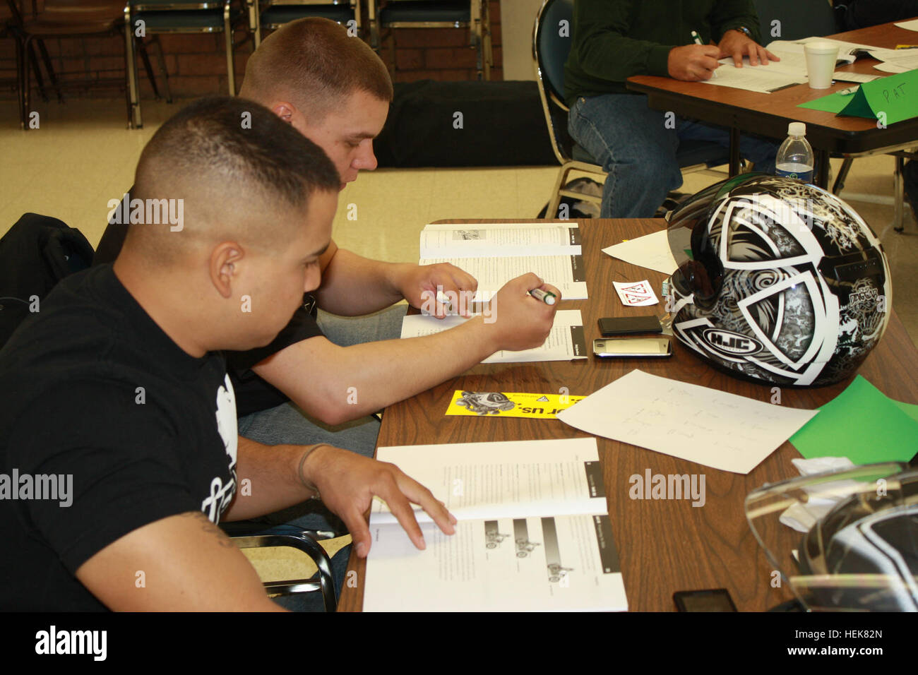 Pfc. Tobias Gallegos and Spc. Nick Bohnsack review materials for the ...