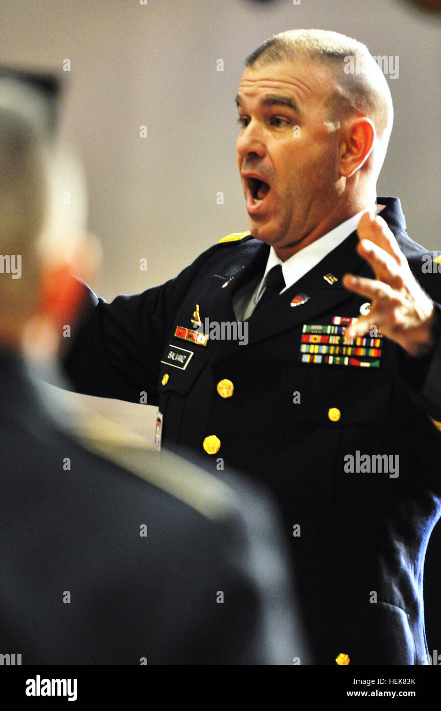 Chief Warrant Officer Gregory Balvanz leads the members of the 56th ...