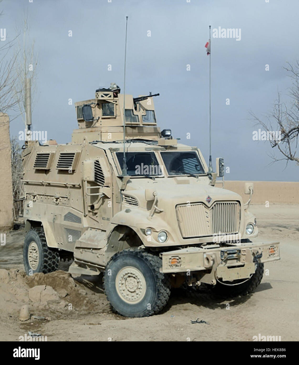 Soldiers in a Mine Resistant Ambush Protected vehicle maneuver across rough terrain while on ...