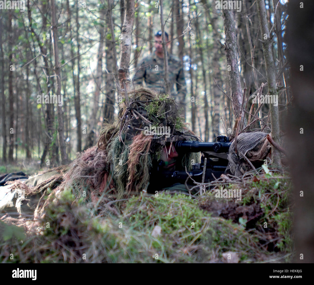 A German Special Forces (SF) Soldier lines his sites on a target 500 ...