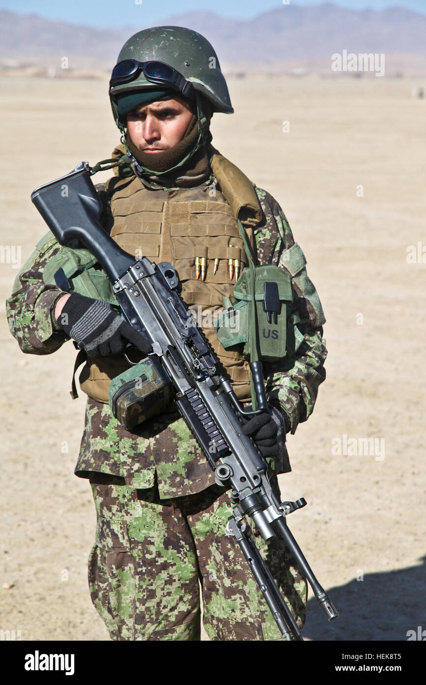 An Afghan National Army soldier stands ready to begin a dismounted ...