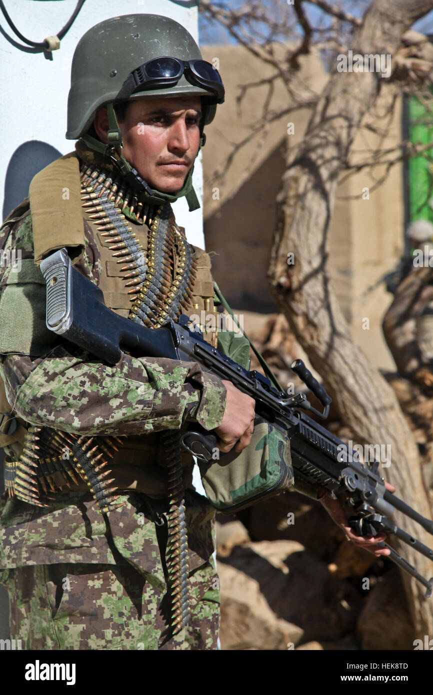An Afghan National Army soldier scans his sector of fire during a short ...