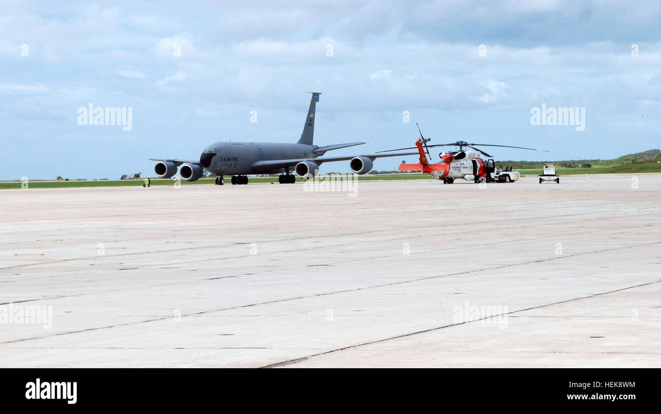 GUANTANAMO BAY, Cuba – An Air Force C-130 Hercules and a U.S. Coast ...