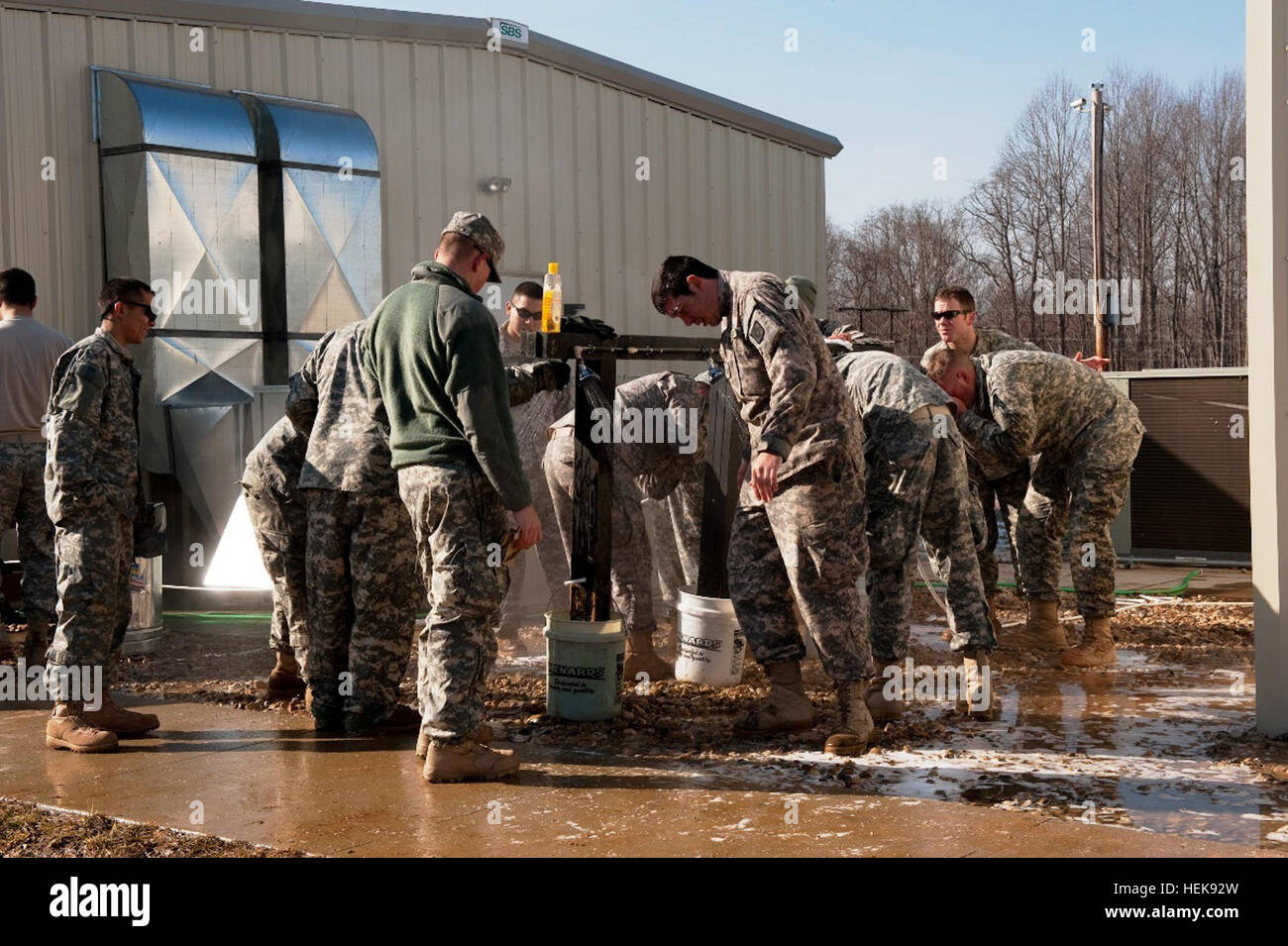 Soldiers with C Company, 1st Battalion, 200th Infantry decontaminate ...
