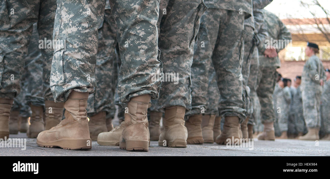 Army Reserve soldiers stand at parade rest at a Fallen Soldier ceremony ...