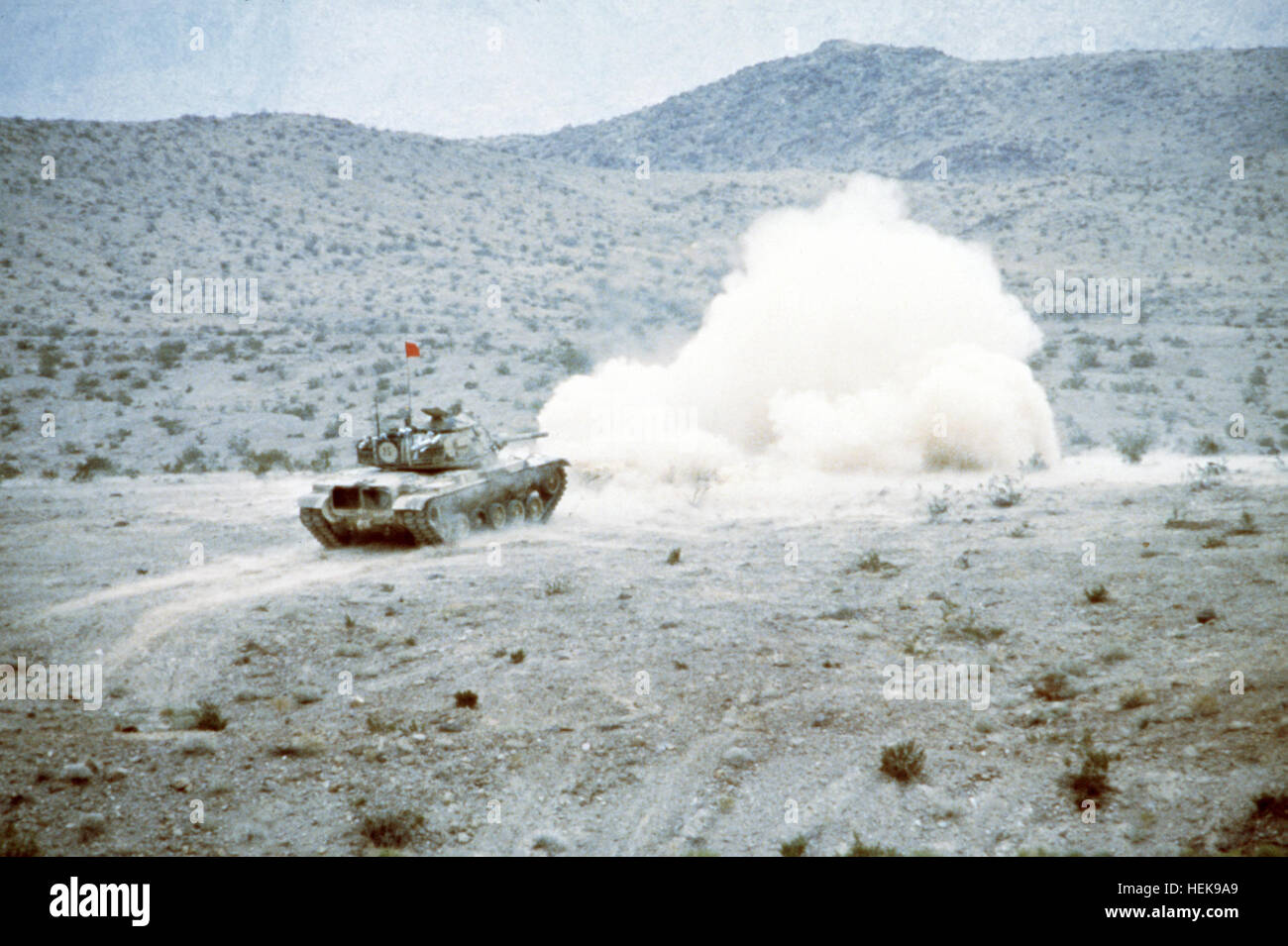 An M60 main battle tank fires at a target during an exercise at the ...