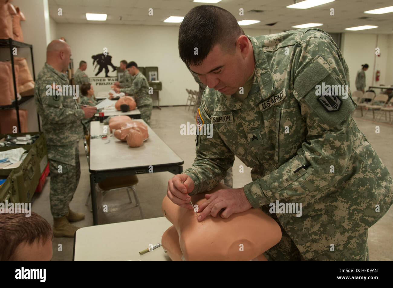 U.S. Army Cpl. Clarence Simpson, right, a retransmission team chief ...