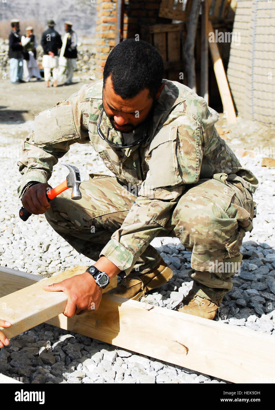 A squad leader from Task Force Iron Ranger fixes a ladder that cost ...