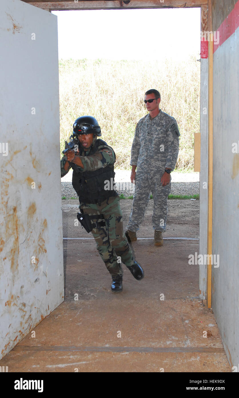 A U.S. weapons sergeant assigned to 7th Special Forces Group observes ...