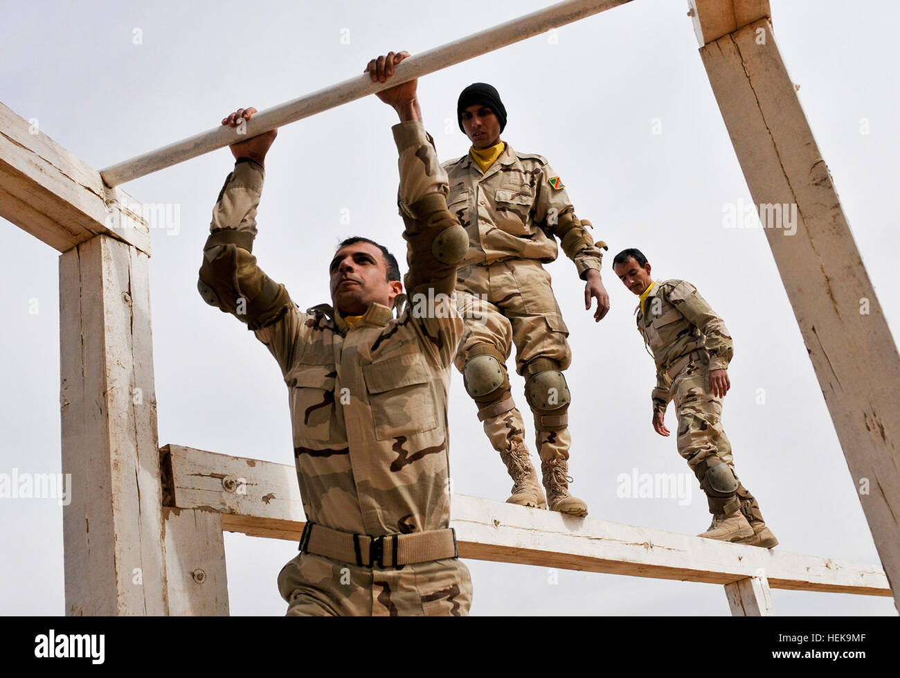 After crossing elevated balance beams, Iraqi soldiers assigned to 4th ...