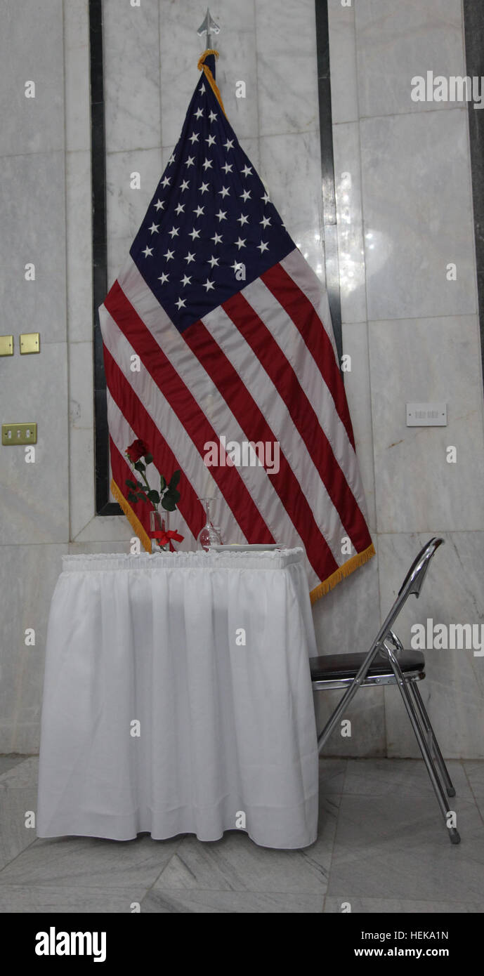 A memorial table is in place to represent fallen service members during ...