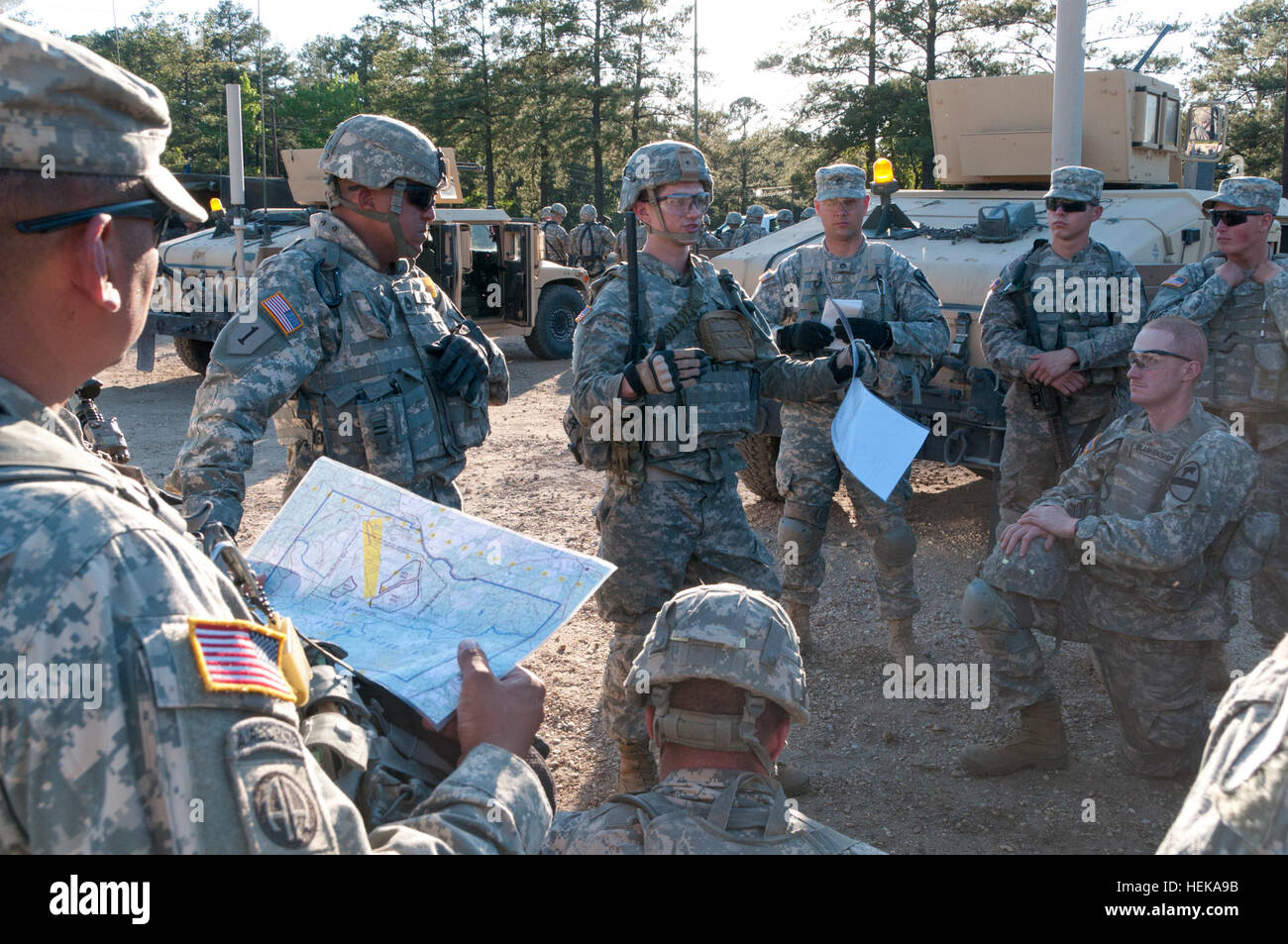 U.S. Army Army 2nd Lt. Philip Macfarland, center, platoon leader of 1st ...