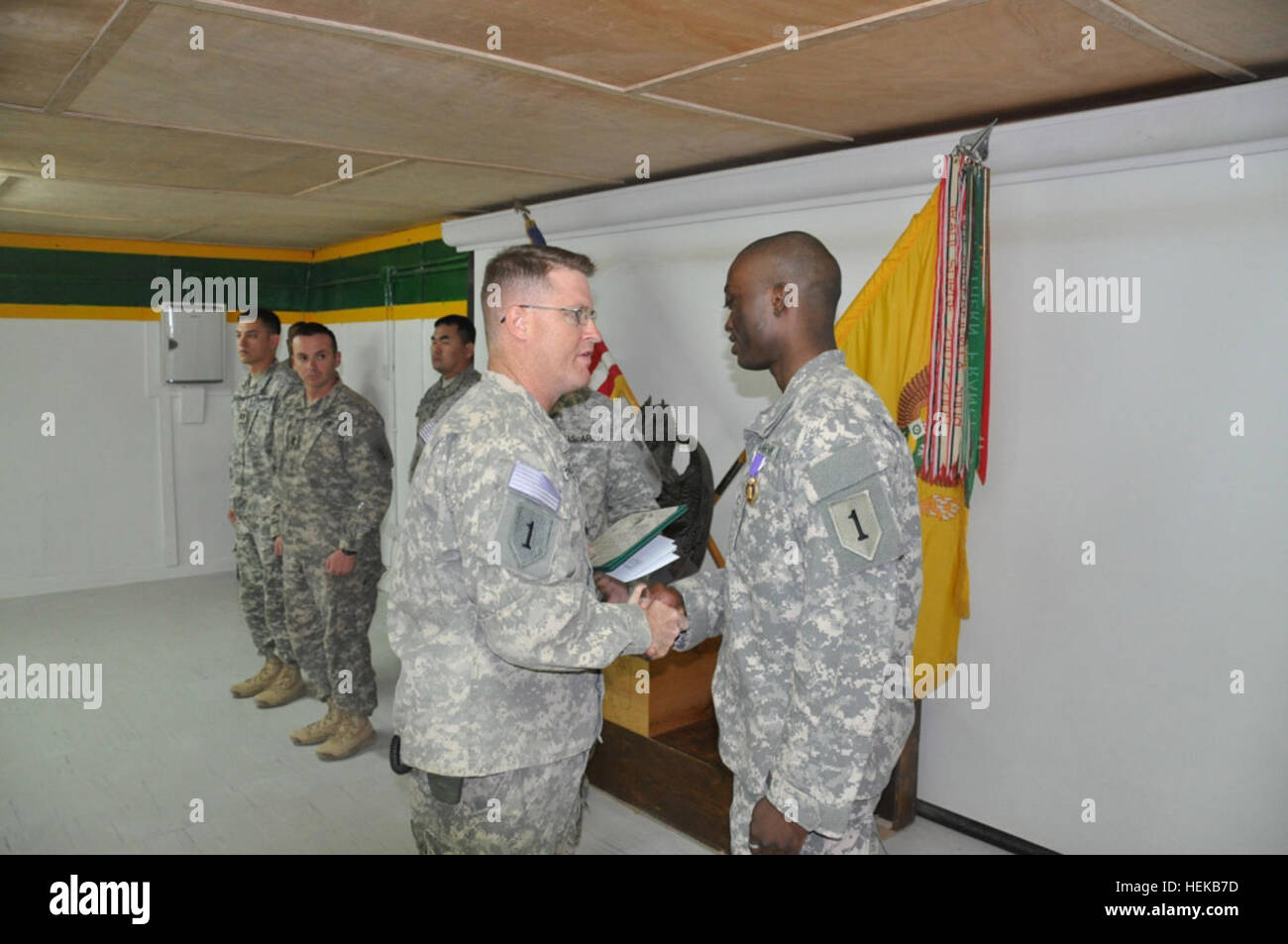 Lt. Col. Michael Henderson, left, commander of 1st Battalion, 63rd ...