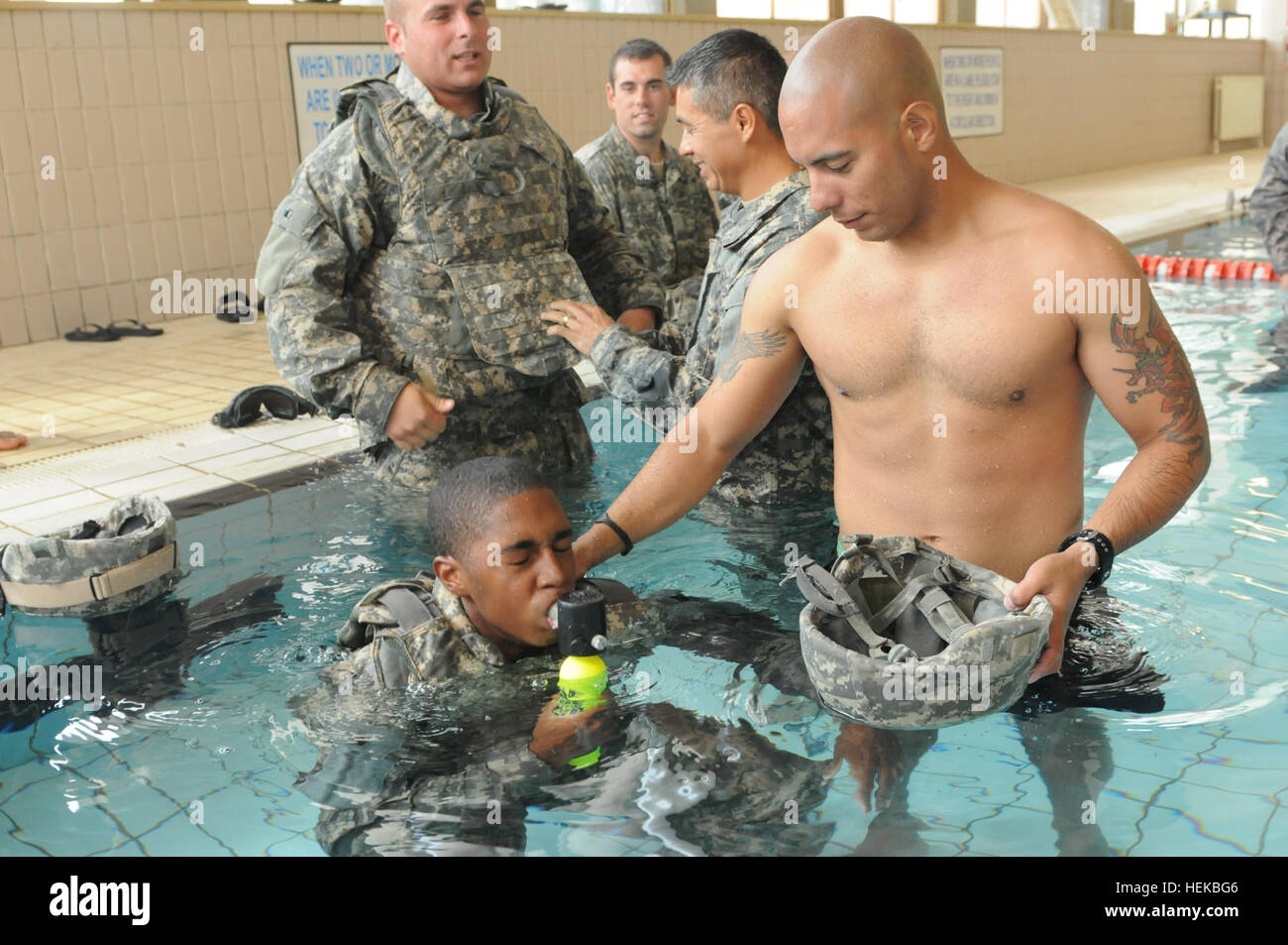 Sgt. Christian Delgado (right), a gunner for the Personal Security ...