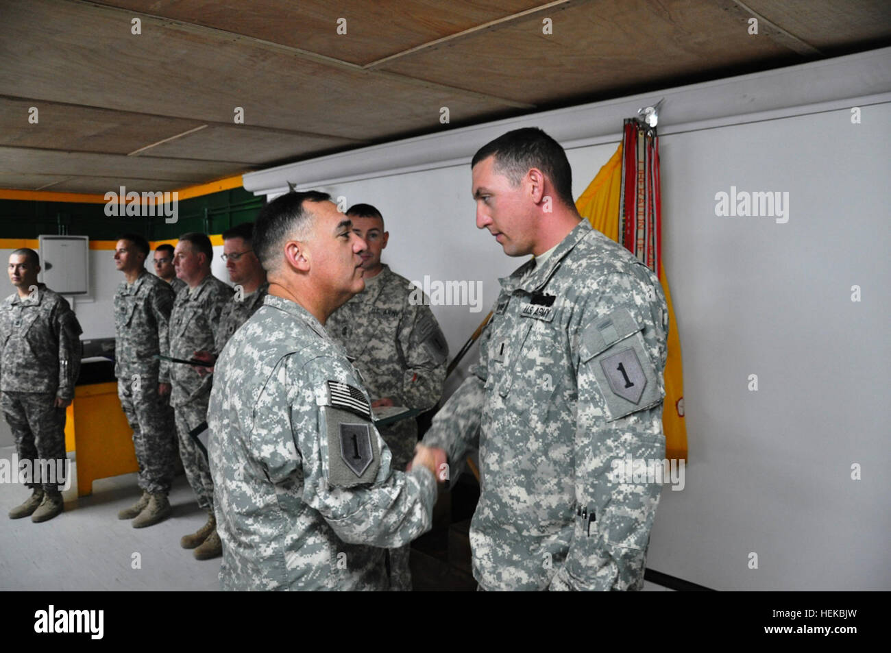 Col. Paul Calvert, left, commander of 2nd Advise and Assist Brigade ...