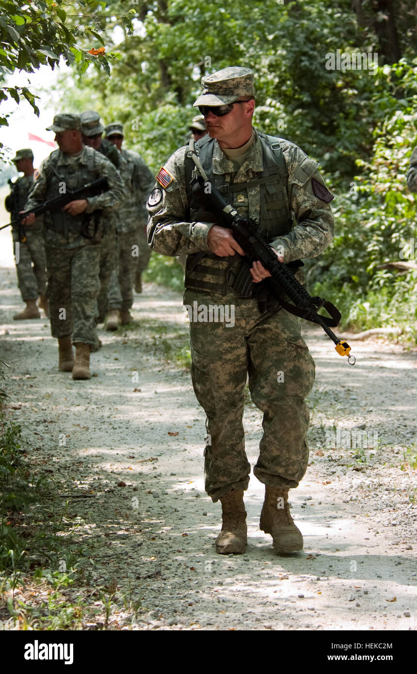 A team of warrant officer candidates conduct a squad level training ...