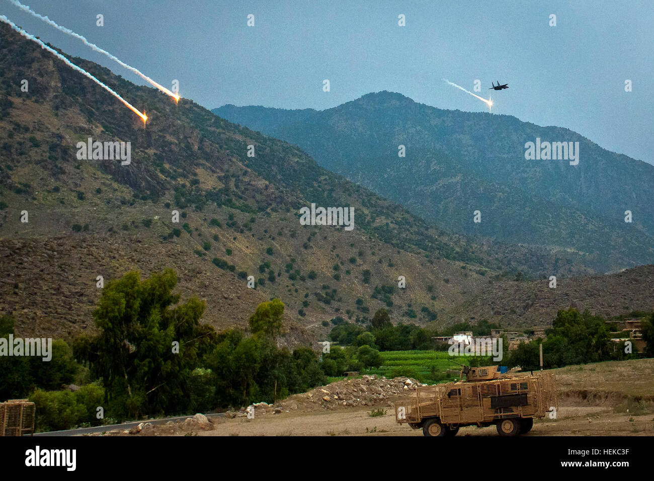 KUNAR PROVINCE, Afghanistan – An F-15 Eagle fighter jet screams low ...