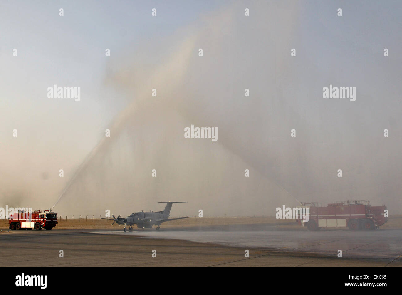 Fire crews assigned to Task Force ODIN shoot water over the C12 ...