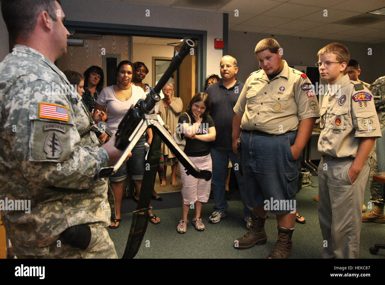 Spc. Lester Colley, 55th Signal Company, shows the M249 saw gun machine ...