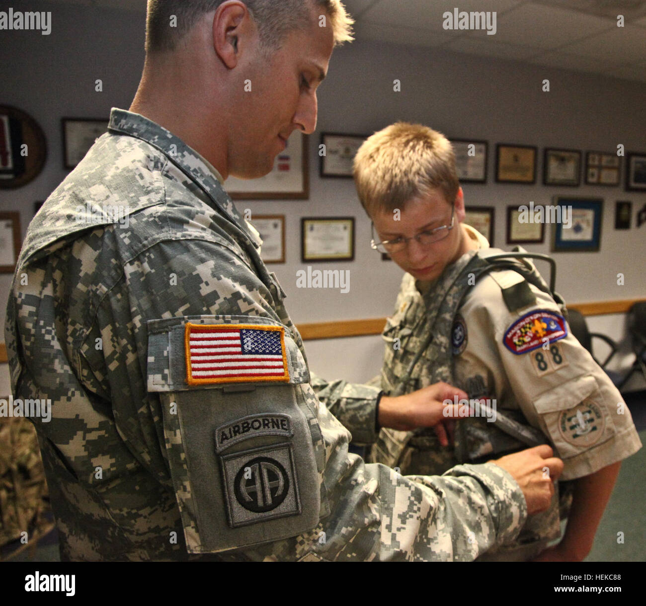 U.S. Army Major Tyler Shelbert, 55th Signal Company, puts an Improved ...