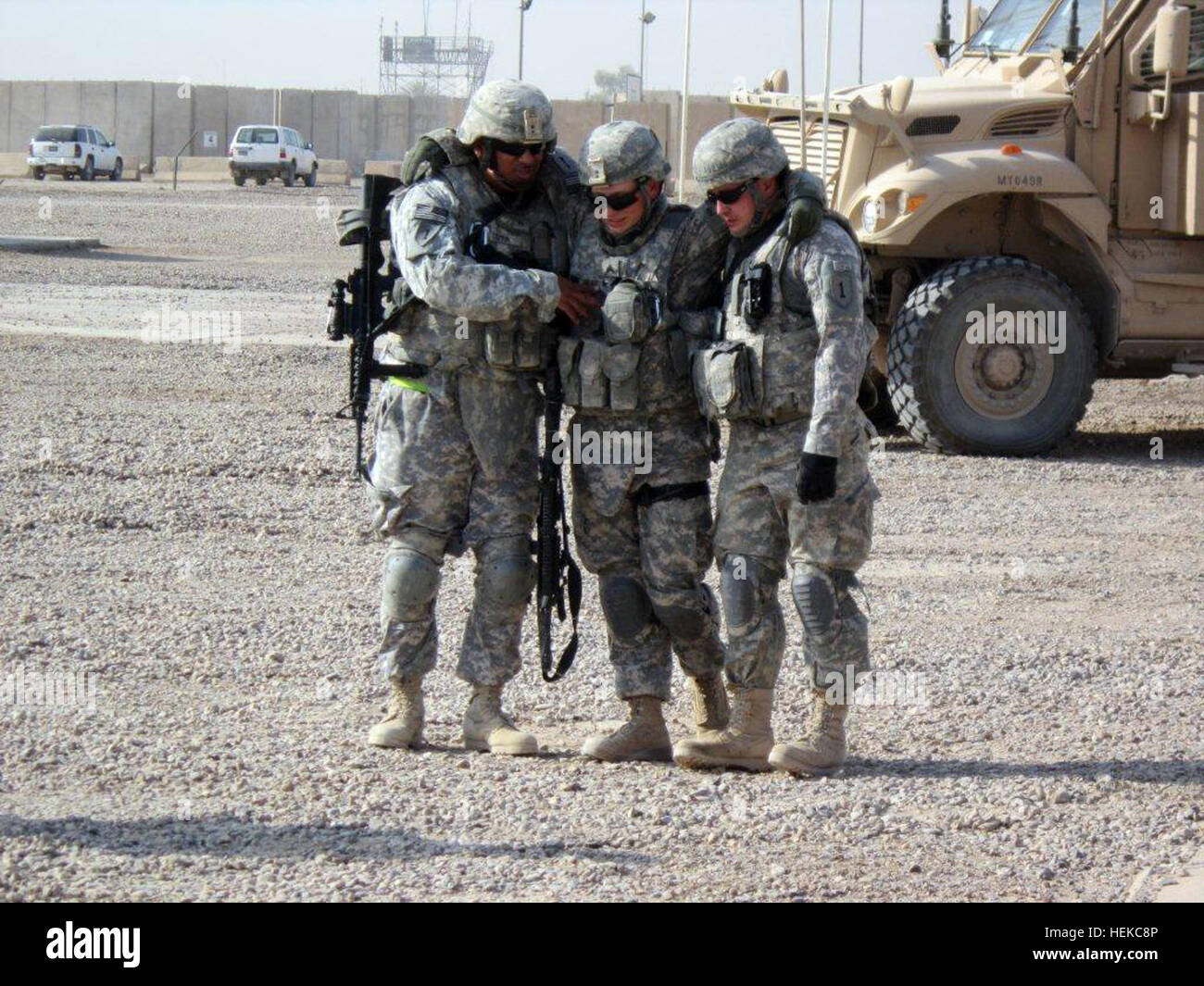 BAGHDAD—Sgt. Jason Coppin, left, a truck commander with Distribution ...