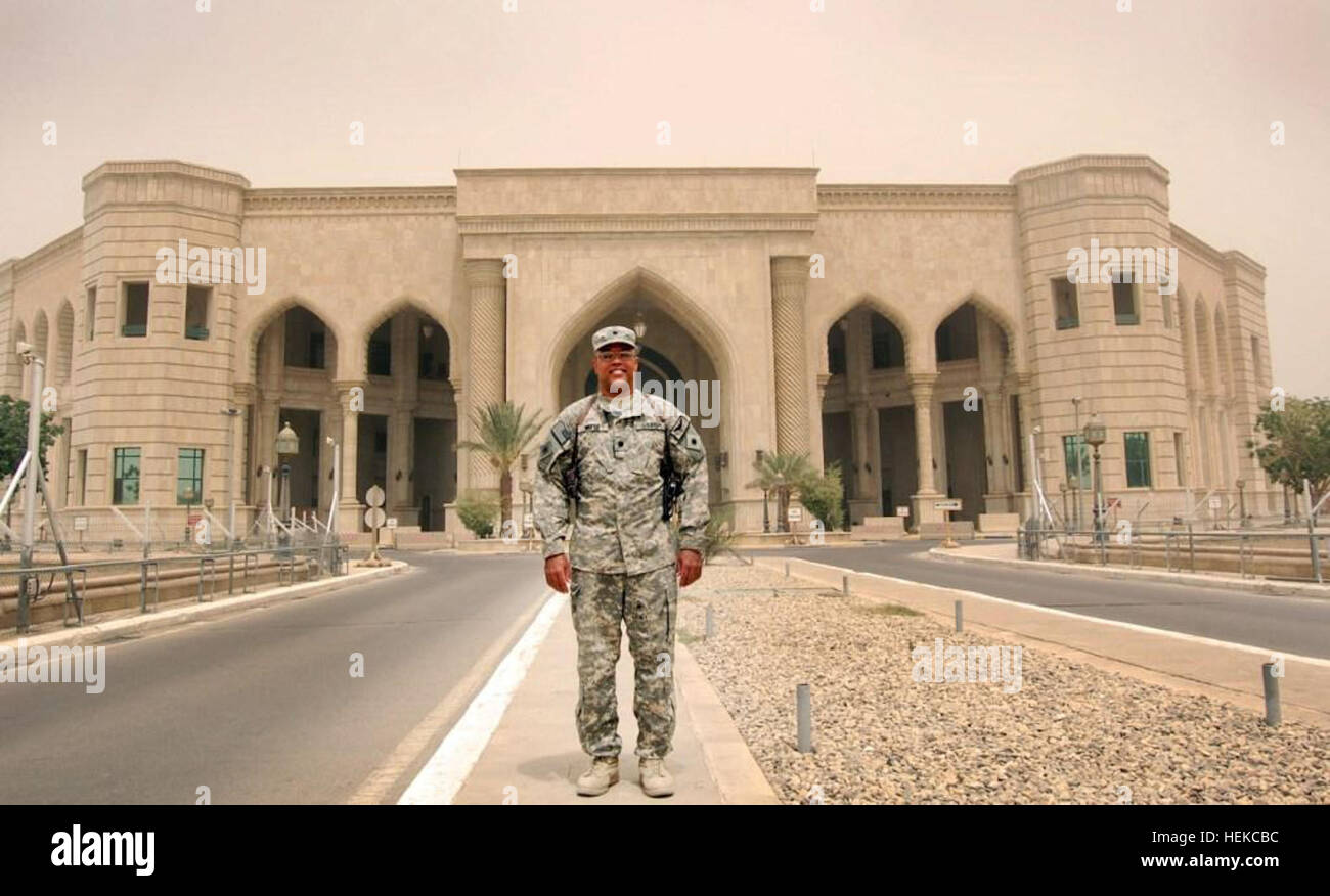 Lt. Col. Raymond Watts stands in front of the Al Faw Palace in Baghdad ...