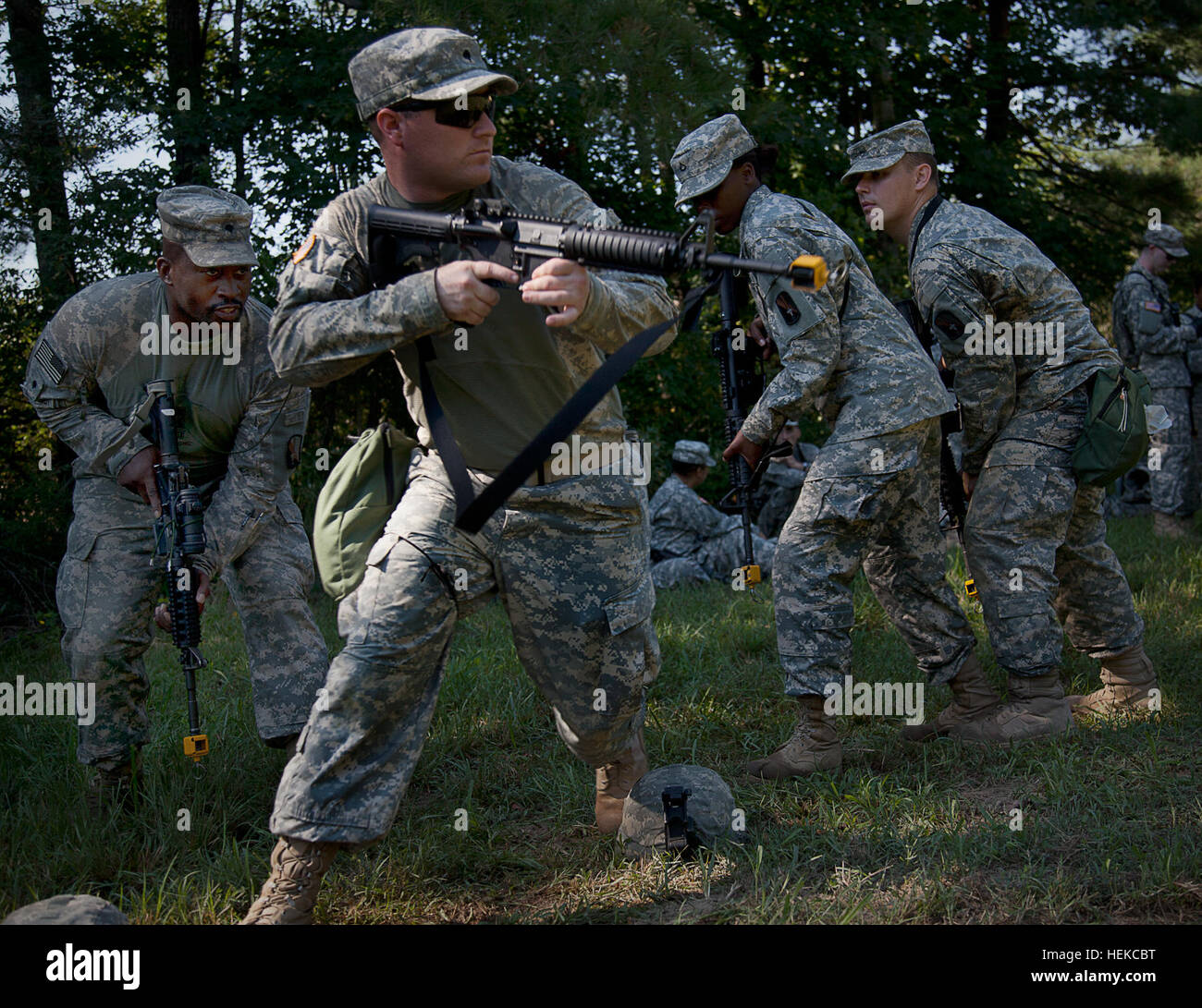 Spc. Percy Hall, 55th Signal Company (Combat Camera), enters through a ...
