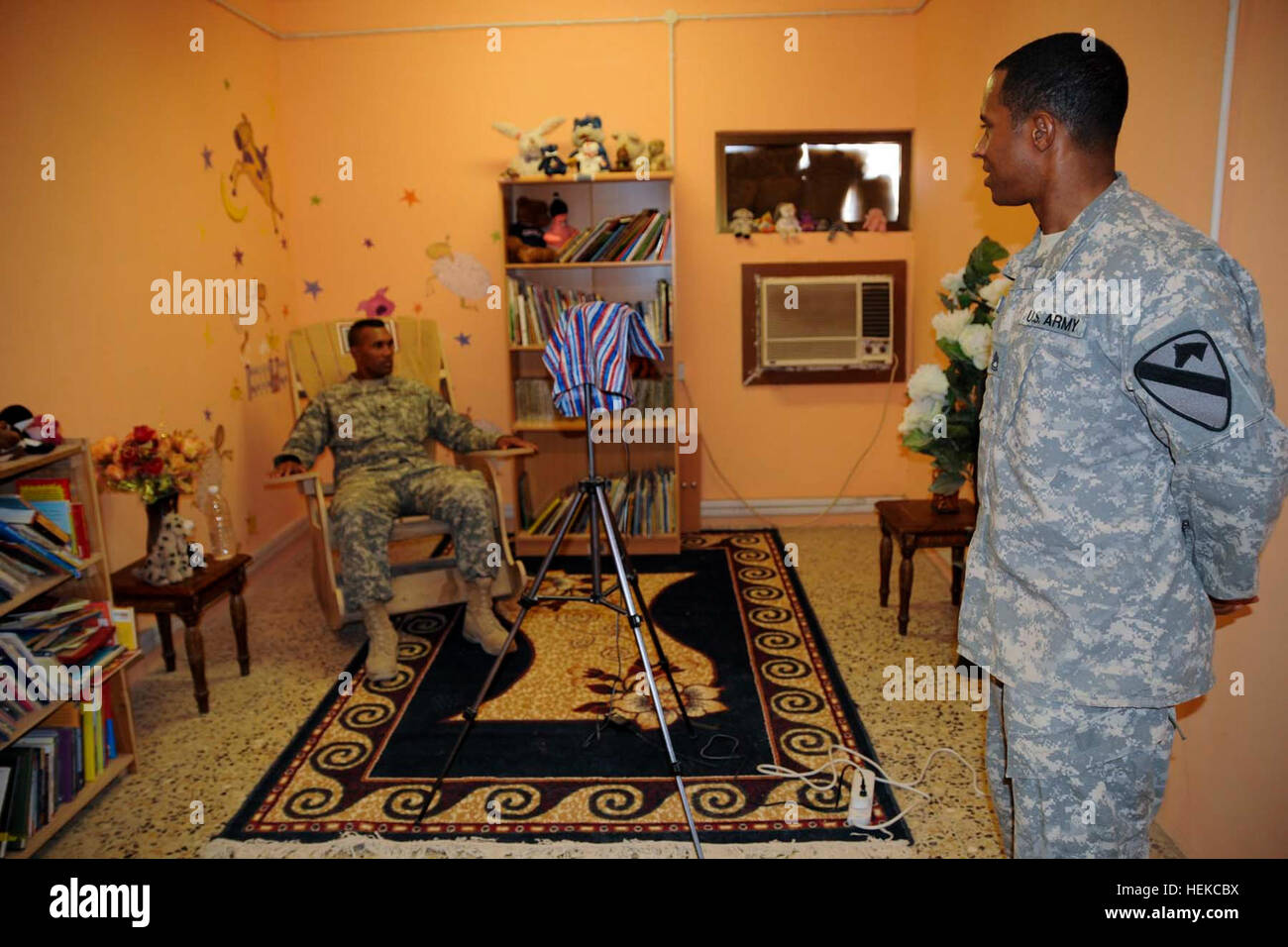 Command Sgt. Maj. Isaia Vimoto (seated) tests out the United Through ...