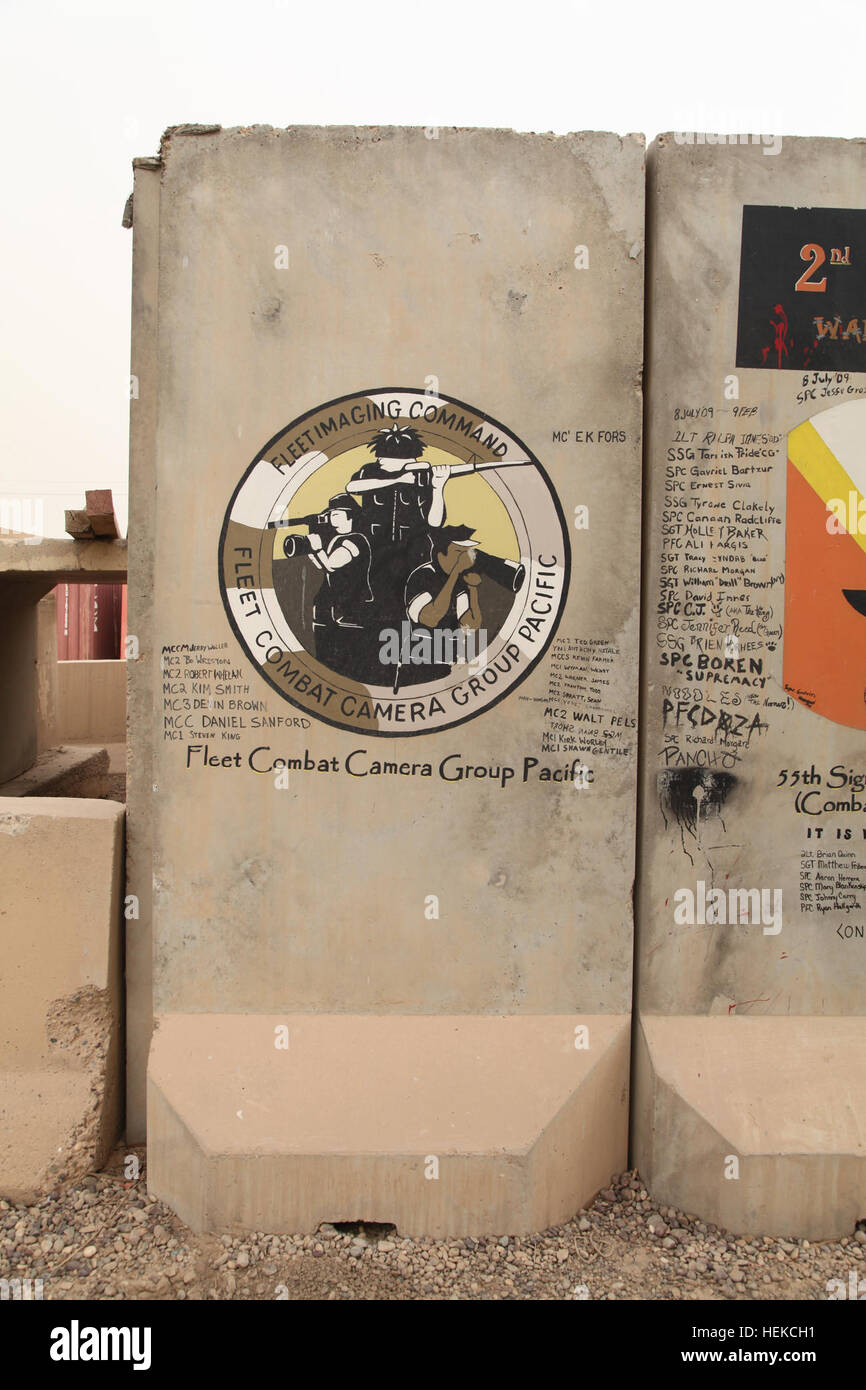 Military and civilian members have painted a number of T-walls on ...