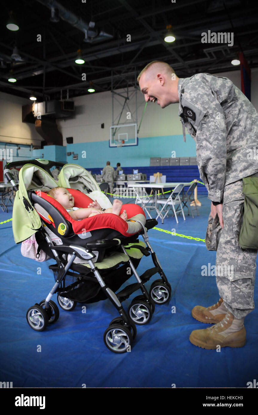 U.S. Army personnel engage with children during noncombatant evacuation ...