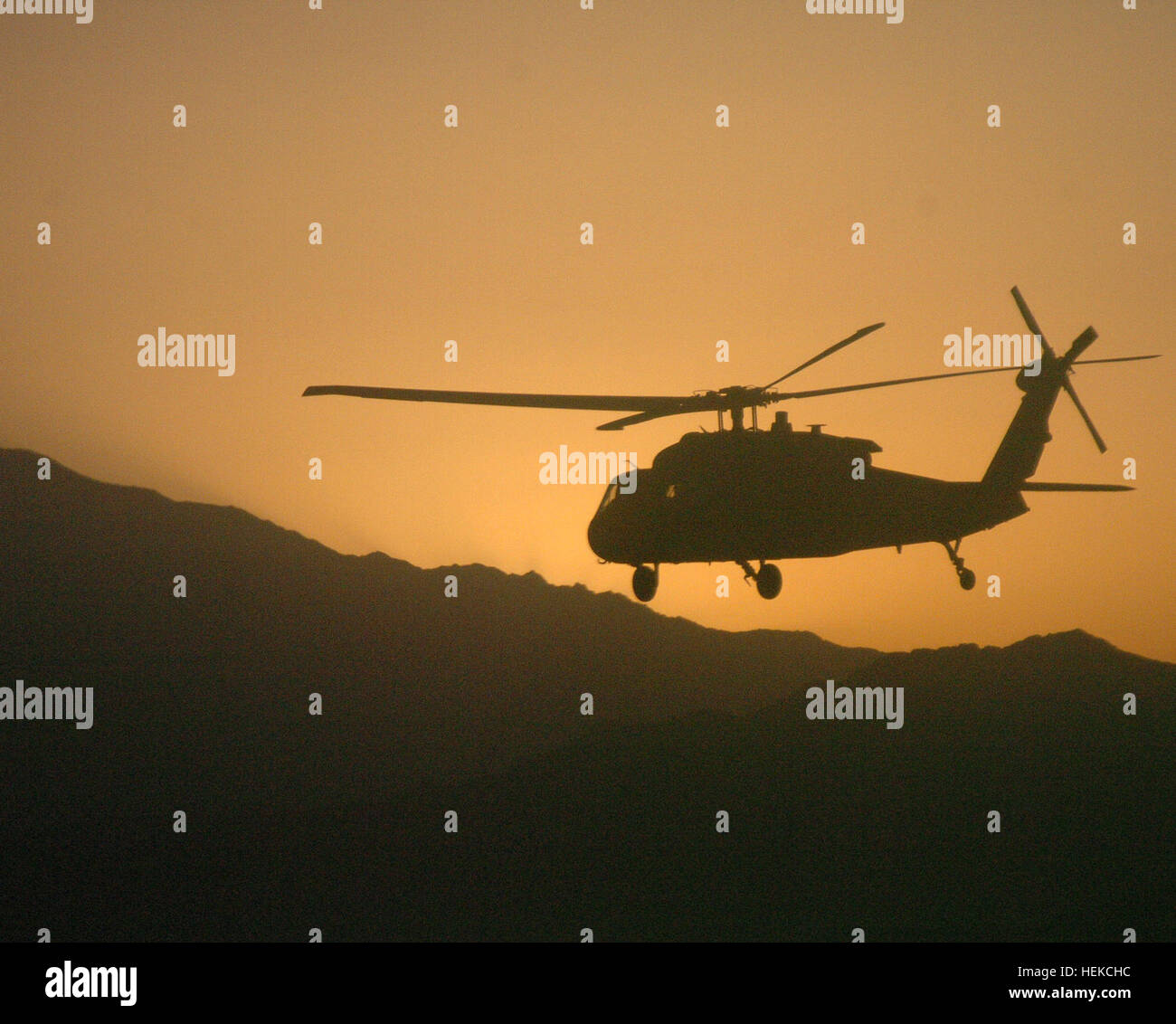 A UH-60 Black Hawk helicopter departs on a transportation mission from ...
