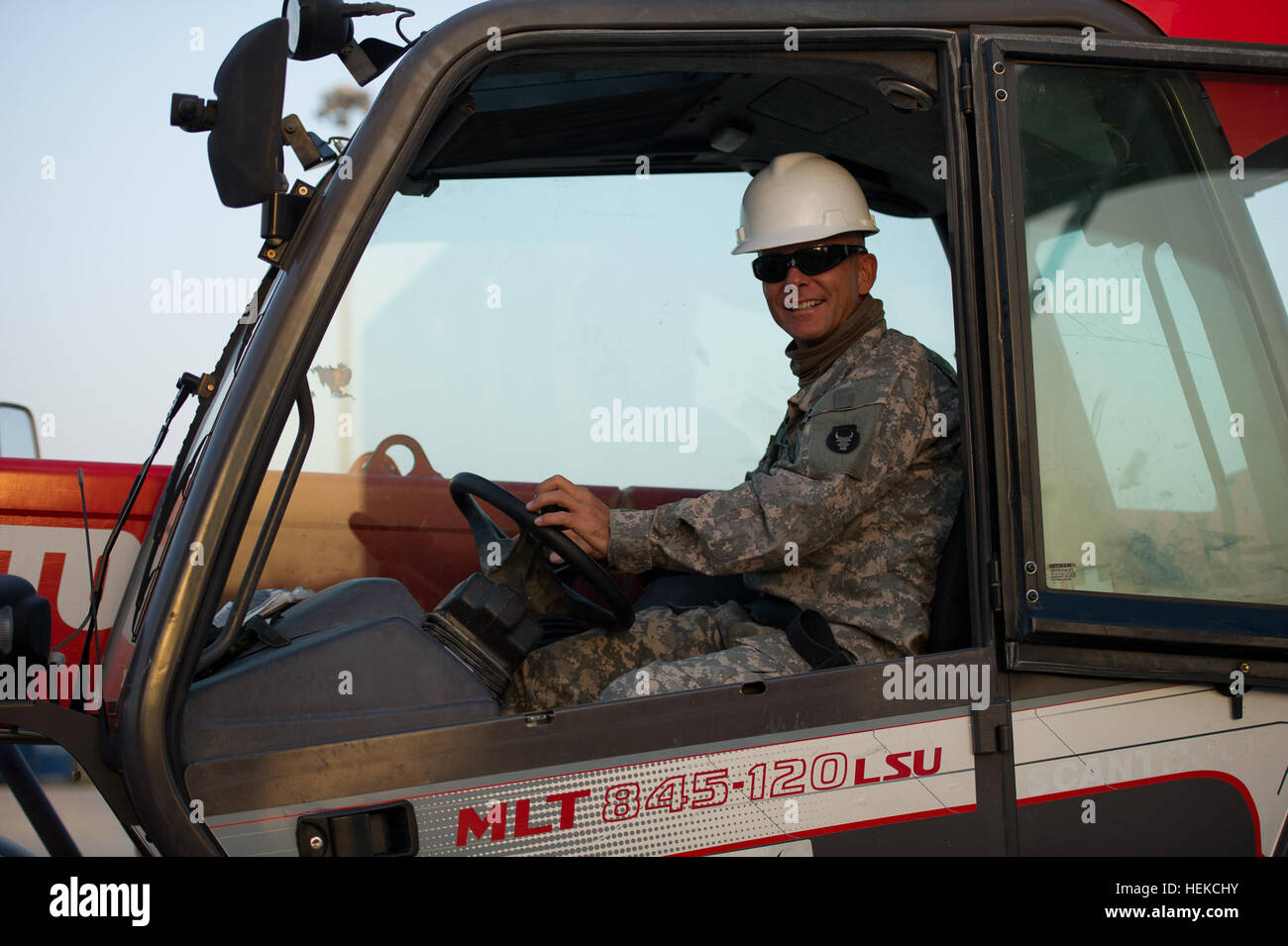 Spc. Josephy A. Lecuyer, from Moundview, MN drives a forklift from a ...