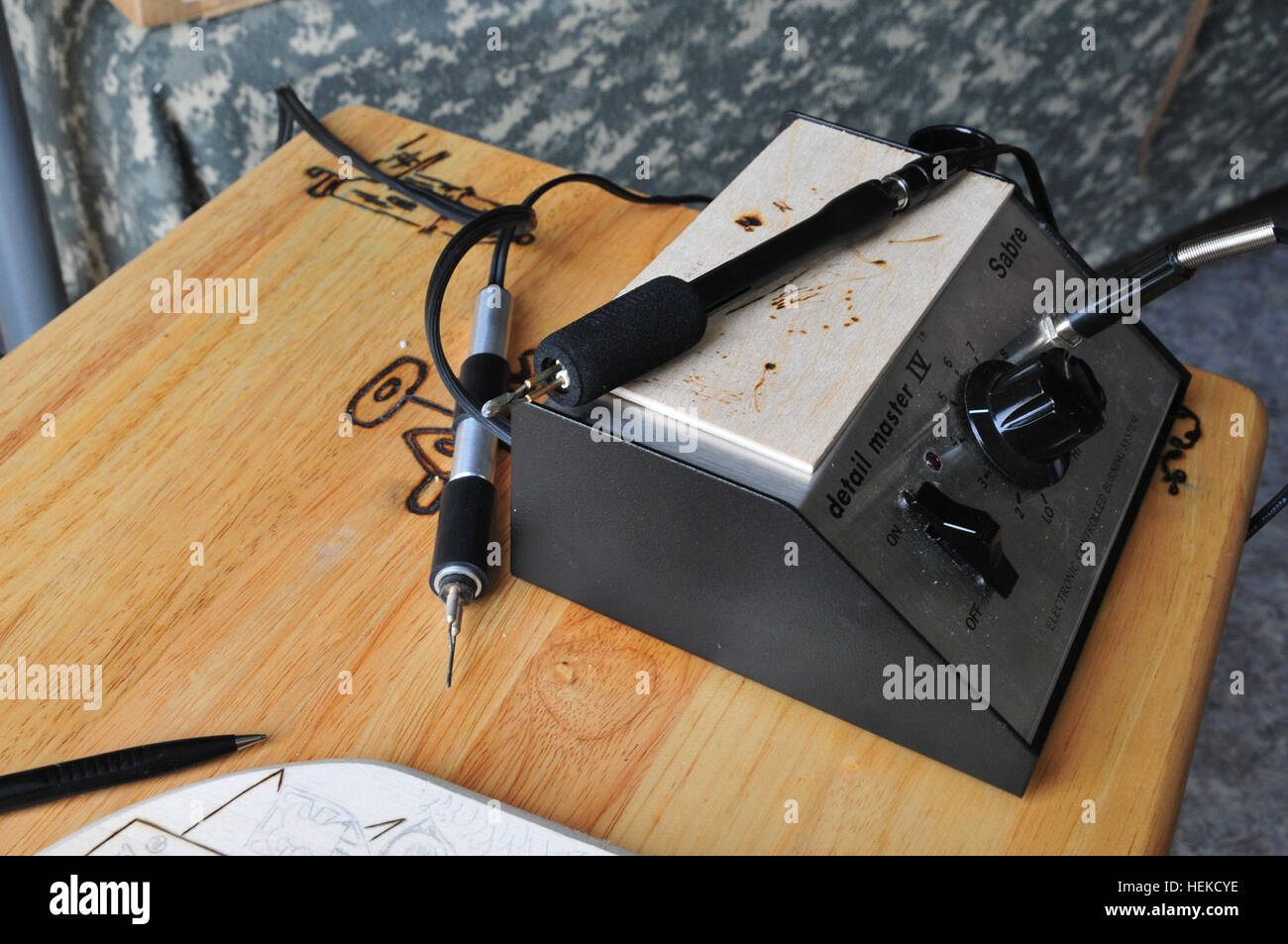 Part of the tool kit for a pyrographer is a woodburning system shown ...