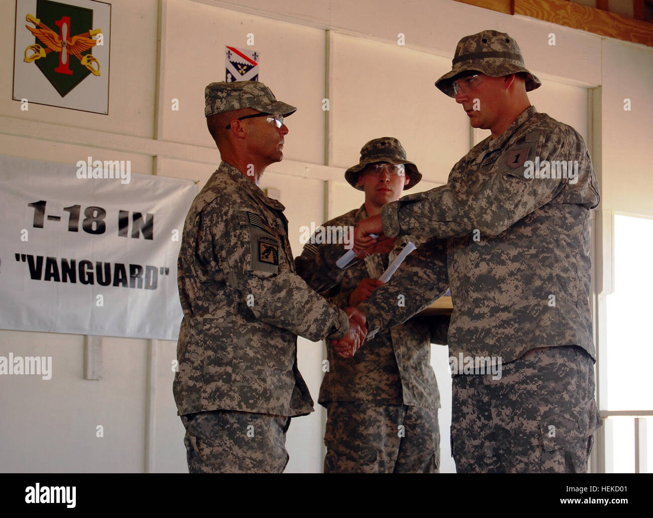 BAGHDAD—Command Sgt. Maj. Earl Rice, left, senior enlisted adviser to ...