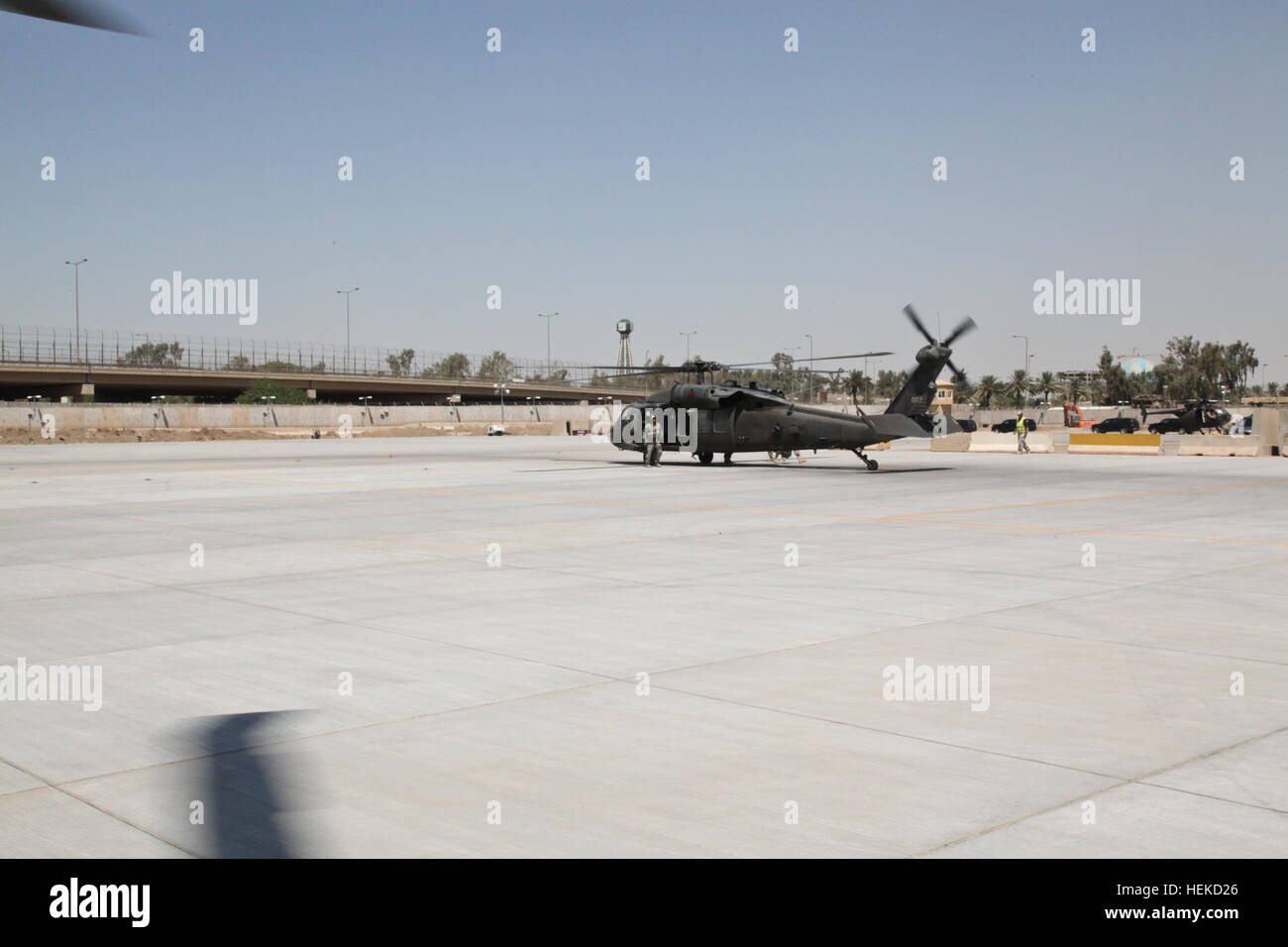 A UH-60 Black Hawk helicopter offloads personnel at Contingency ...