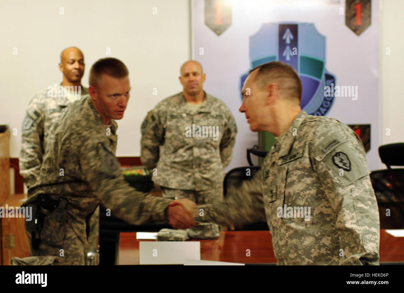 Maj. Gen. Bernard S. Champoux, right, commanding general of the 25th ...